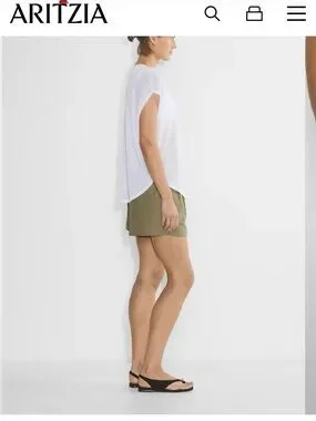 Aritzia | Shorts | Aritzia Effortless Mid Thigh Short Cruiselinen Green ...